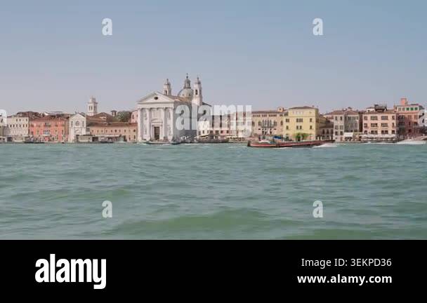 Venetian coastline filmed from a moving boat in Venice, Italy. Historic ...