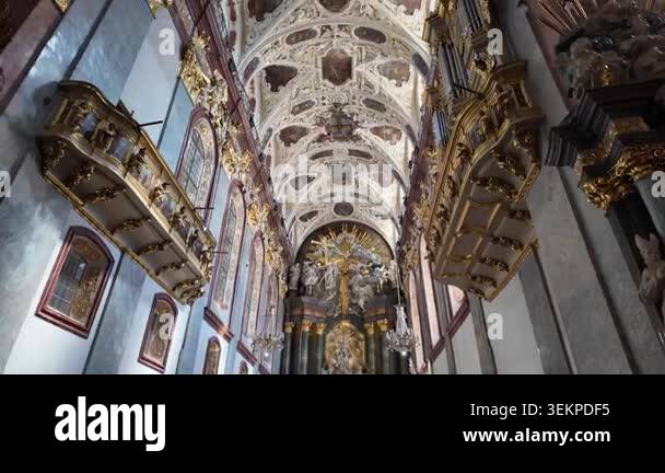 The breathtaking, ornate golden altar and baroque interior architecture ...