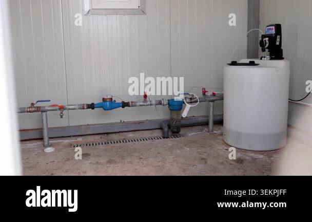 Water filtration system components including pipes and valves are ...