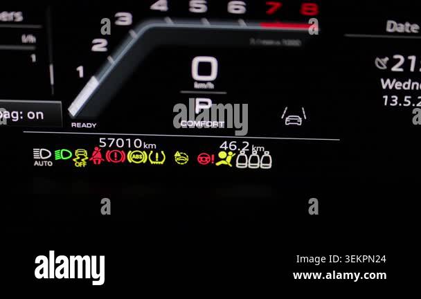 Many different car dashboard lights with warning lamps illuminated ...