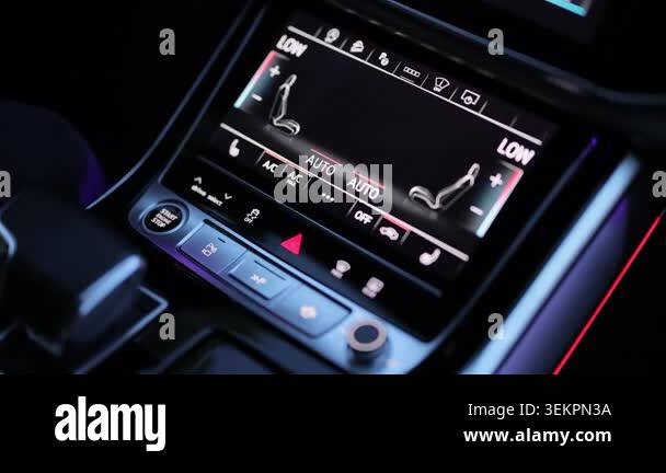 Pressing Stand By Car air conditioning button inside a car. Modern car ...