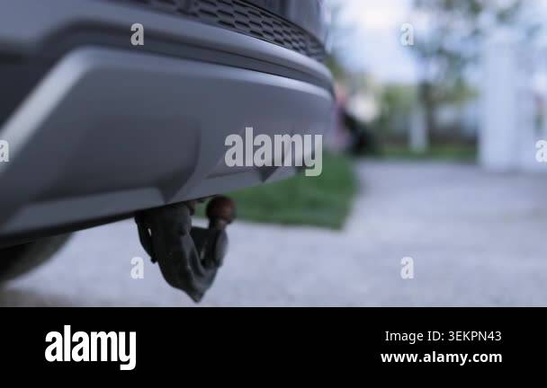 Tow bar and tow ball on a car. Towbar on car black steel part. Car ...