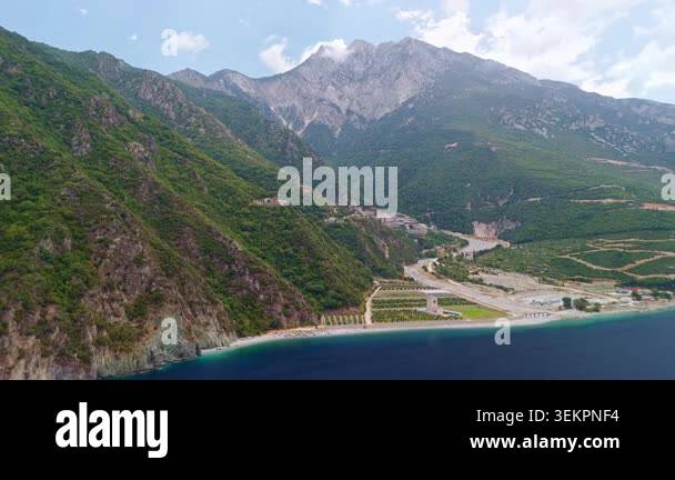 Aerial view of the majestic Holy Athos Mountain rising from the Aegean ...