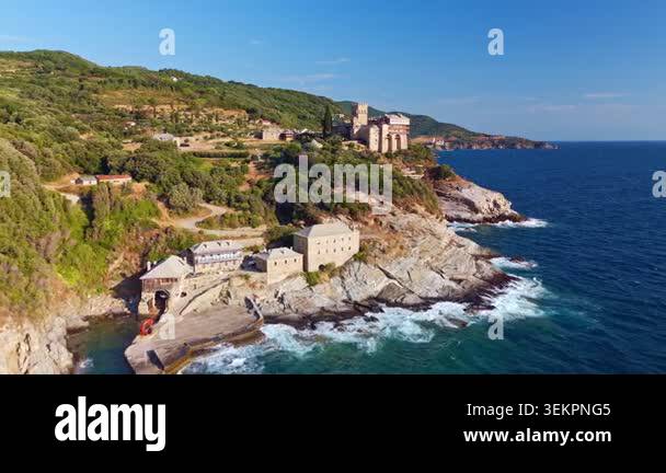 Aerial view of the Holy Monastery of Stavronikita perched on a rocky ...