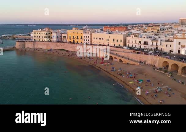 Aerial view of the historic island of Gallipoli at sunset. The golden ...