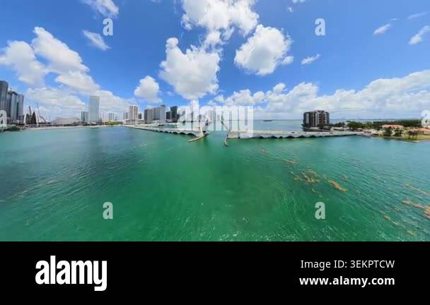 Aerial flight above the Venetian Causeway Miami convert to tiny planet ...