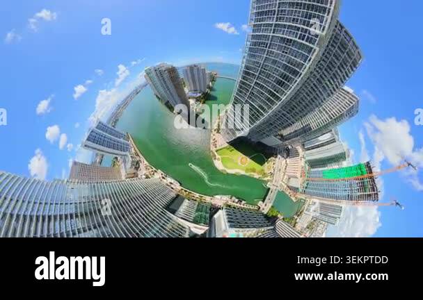 Aerial video tiny planet of skyscrapers Downtown Miami river Brickell ...