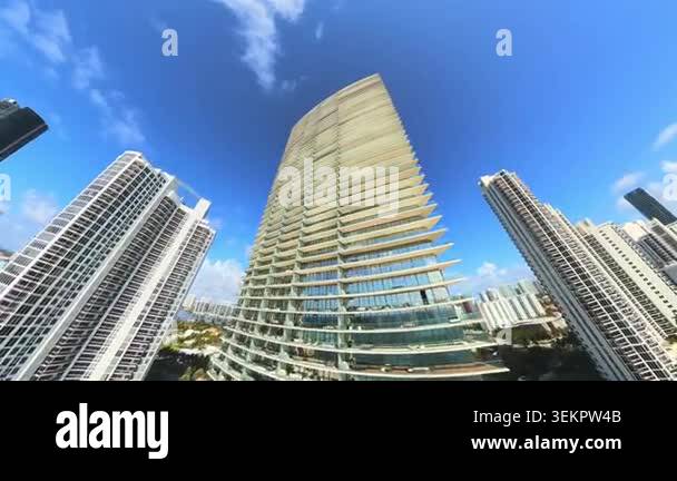 FPV drone flying above buildings and reveal view of the beach 4k 60p ...