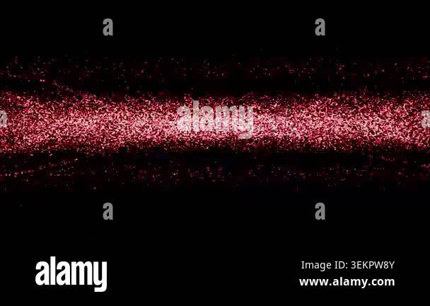 Grainy red particle stream flowing horizontally on black background ...