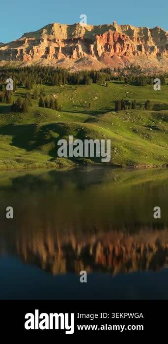 Vertical Screen: Montana, USA scenic landscape featuring dramatic red ...