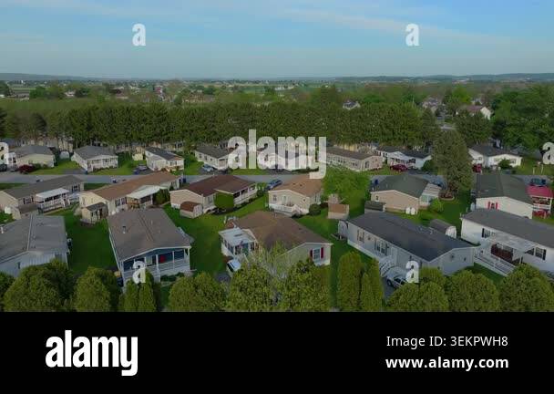 The camera shows a birds eye view of a neighborhood. Mobile and ...