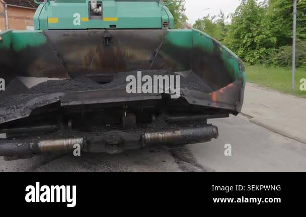 Valmiera, Latvia - May 28, 2026: Vogele asphalt paver releases hot ...