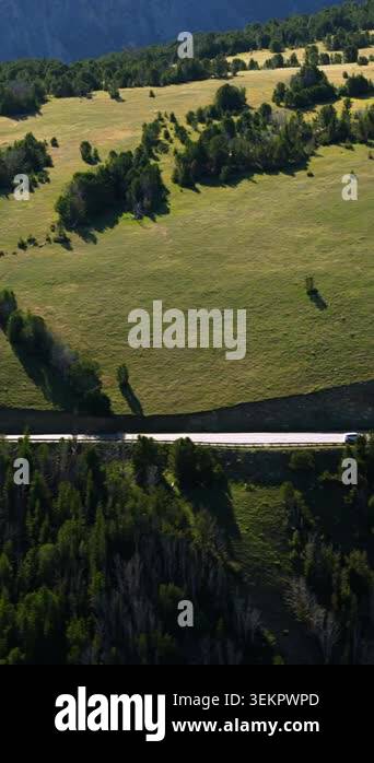 Vertical Screen: Beartooth Highway in Montana USA with vehicles ...