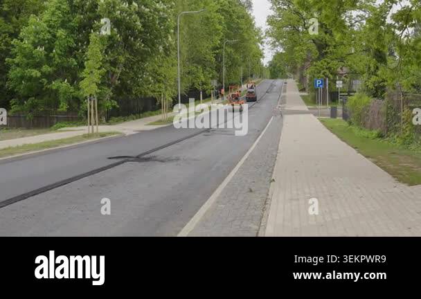 Valmiera, Latvia - May 28, 2026: Road construction with asphalt roller ...