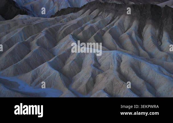 Dramatic Zabriskie Point in Death Valley in badlands formations display ...