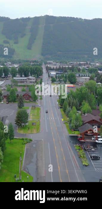 Vertical Screen: Aerial drone footage of Jackson Hole mountain town ...