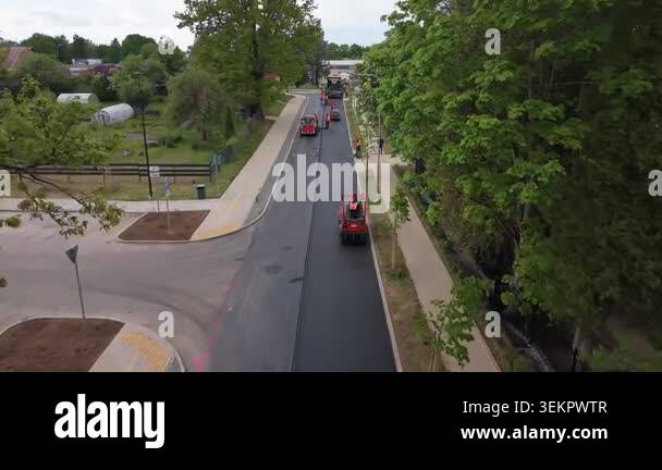 Valmiera, Latvia - May 28, 2026: Construction workers in orange vests ...