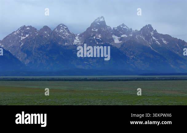 Aerial drone footage captures iconic Grand Teton mountain range in ...