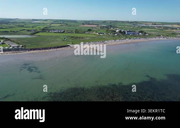 Drone aerial view of Garryvoe Beach in County Cork, Ireland on a bright ...