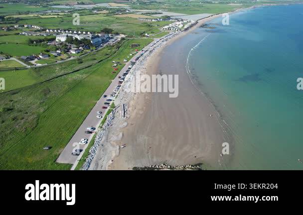 Drone aerial view of Garryvoe Beach in County Cork, Ireland on a bright ...
