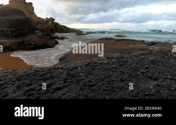 Idyllic coastal landscape with rocky shoreline and powerful Atlantic ...
