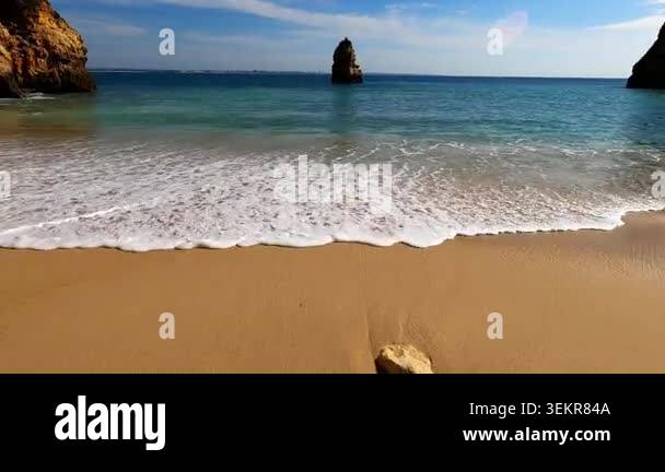 Idyllic coastal landscape with rocky cliffs and crashing Atlantic waves ...