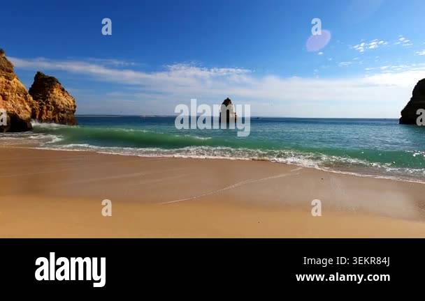 Idyllic coastal landscape with rocky cliffs and crashing Atlantic waves ...