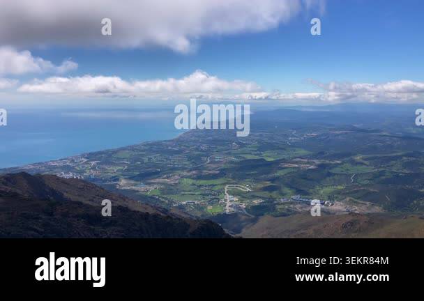 Sweeping mountain panorama revealing the sparkling Mediterranean Sea ...