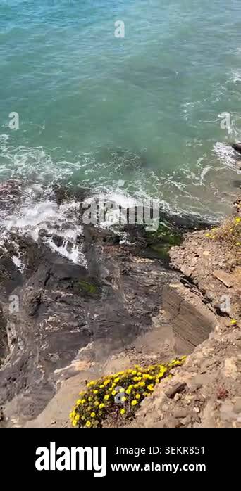 Blue calm sea stretches alongside the promenade creating relaxing ...