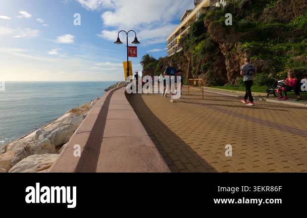 TORREMOLINOS, SPAIN - FEBRUARY 1 2026: Runners compete in a half ...