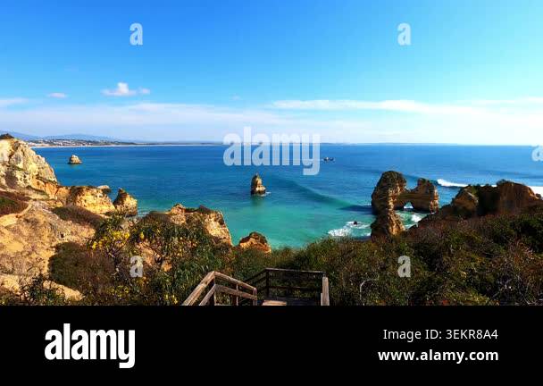 Idyllic coastal landscape with rocky cliffs and crashing Atlantic waves ...