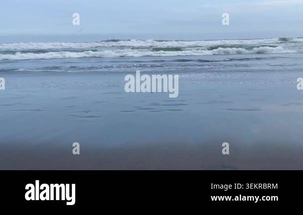 Calm Ocean Waves Crashing on a Serene Sandy Beach Stock Video Footage ...