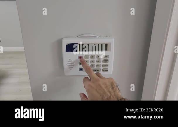 Static video footage of a modern electronic security alarm keypad ...