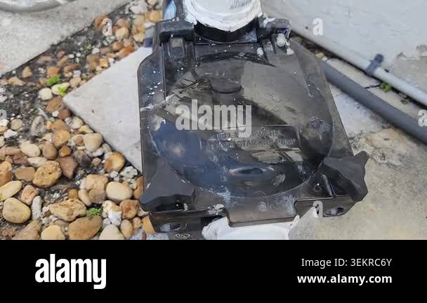 Detailed video clip of a pool pump strainer enclosure with transparent ...