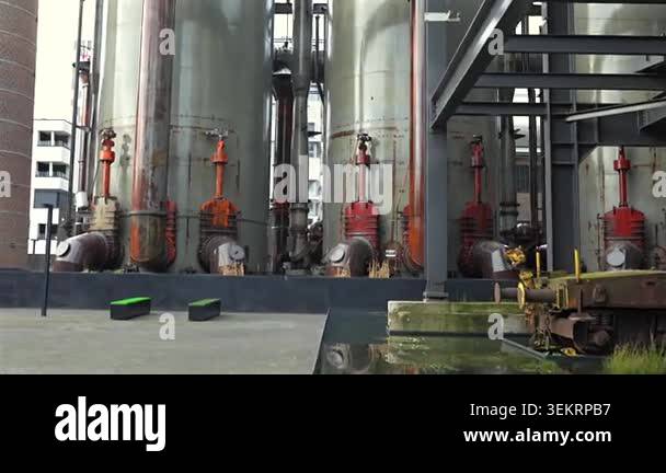 Historic steel silos and brick chimney in Belval Luxembourg Stock Video ...