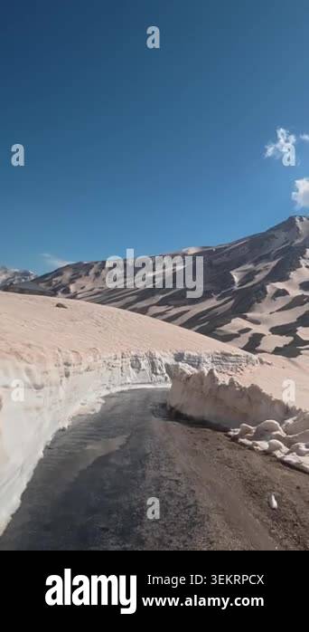 Snowy mountain landscape. on top of the mountain. Snow-covered mountain ...
