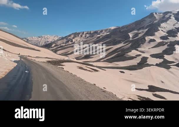 Snowy mountain landscape. on top of the mountain. Snow-covered mountain ...