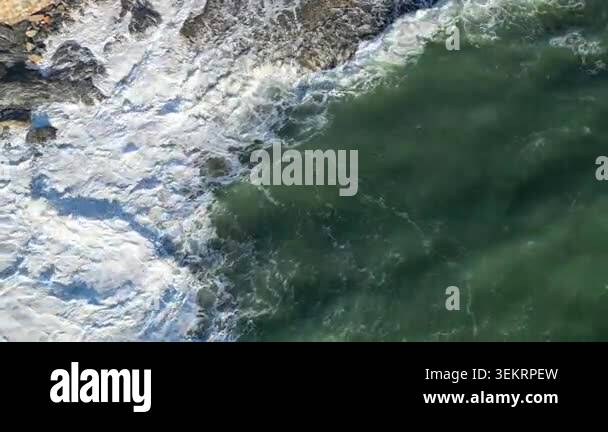 Cliffside turquoise sea. Ocean rocky cliff. Waves crashing rocks. High ...