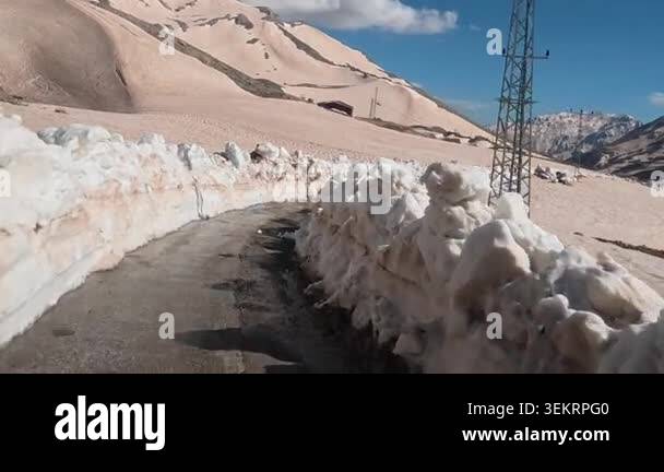 Snowy mountain landscape. on top of the mountain. Snow-covered mountain ...