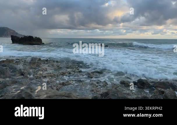 Waves rocky sunset. Ocean cloudy horizon.Seascape at sunset, clouds ...