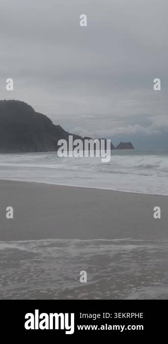 Cloudy beach waves. Waves beach cliff. sandy beach, sea foam, dramatic ...