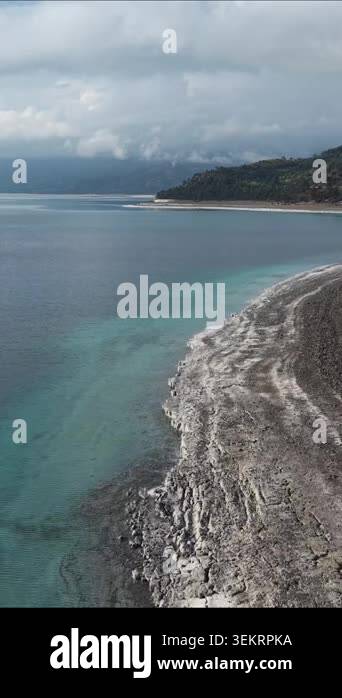 view from a drone of a lake in the mountains, turquoise water. High ...