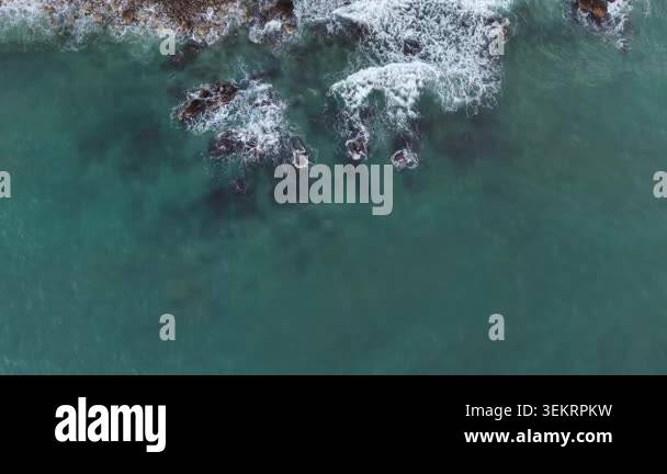Cliffside turquoise sea. Ocean rocky cliff. Waves crashing rocks. High ...