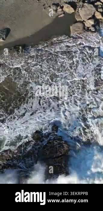 Cliffside turquoise sea. Ocean rocky cliff. Waves crashing rocks. High ...