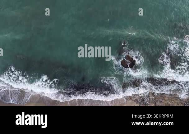 Cliffside turquoise sea. Ocean rocky cliff. Waves crashing rocks. High ...