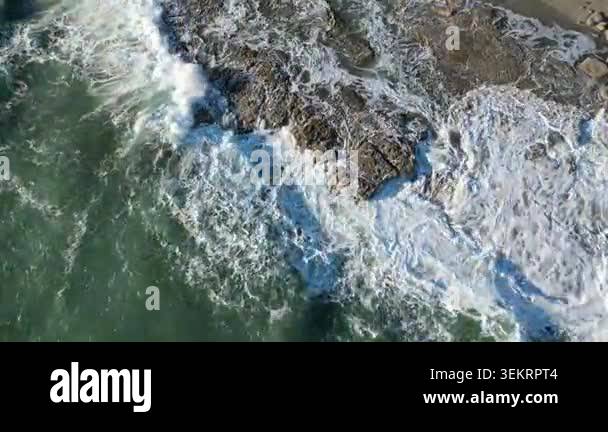 Cliffside turquoise sea. Ocean rocky cliff. Waves crashing rocks. High ...