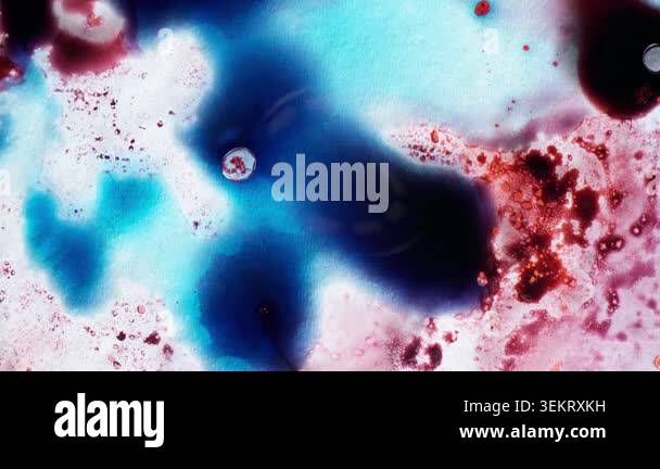Cosmic nebula textures created with purple and blue alcohol ink. An ...