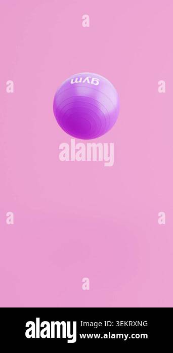 Fitness Ball Bouncing on Pink Background with Copy Space, Vertical ...