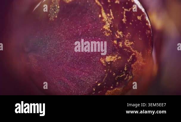 Shimmer ink. Fluid mix. Defocused yellow purple golden color acrylic ...