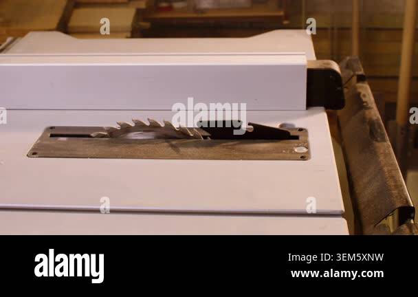 Professional joinery production. Table saw. Circular sharp metal blade ...